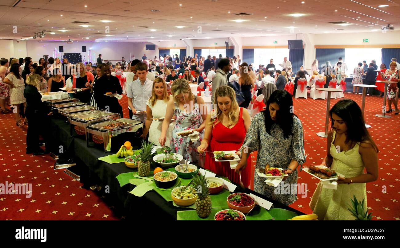 Guests enjoying a buffet at the MW Solicitors Summer Party held at ...