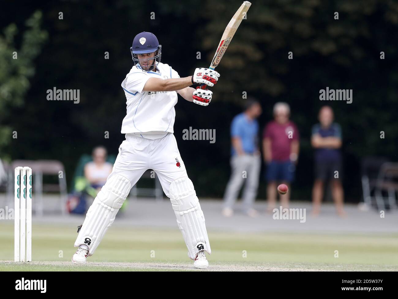Derbyshire's Alex Hughes hits out against Durham Stock Photo - Alamy