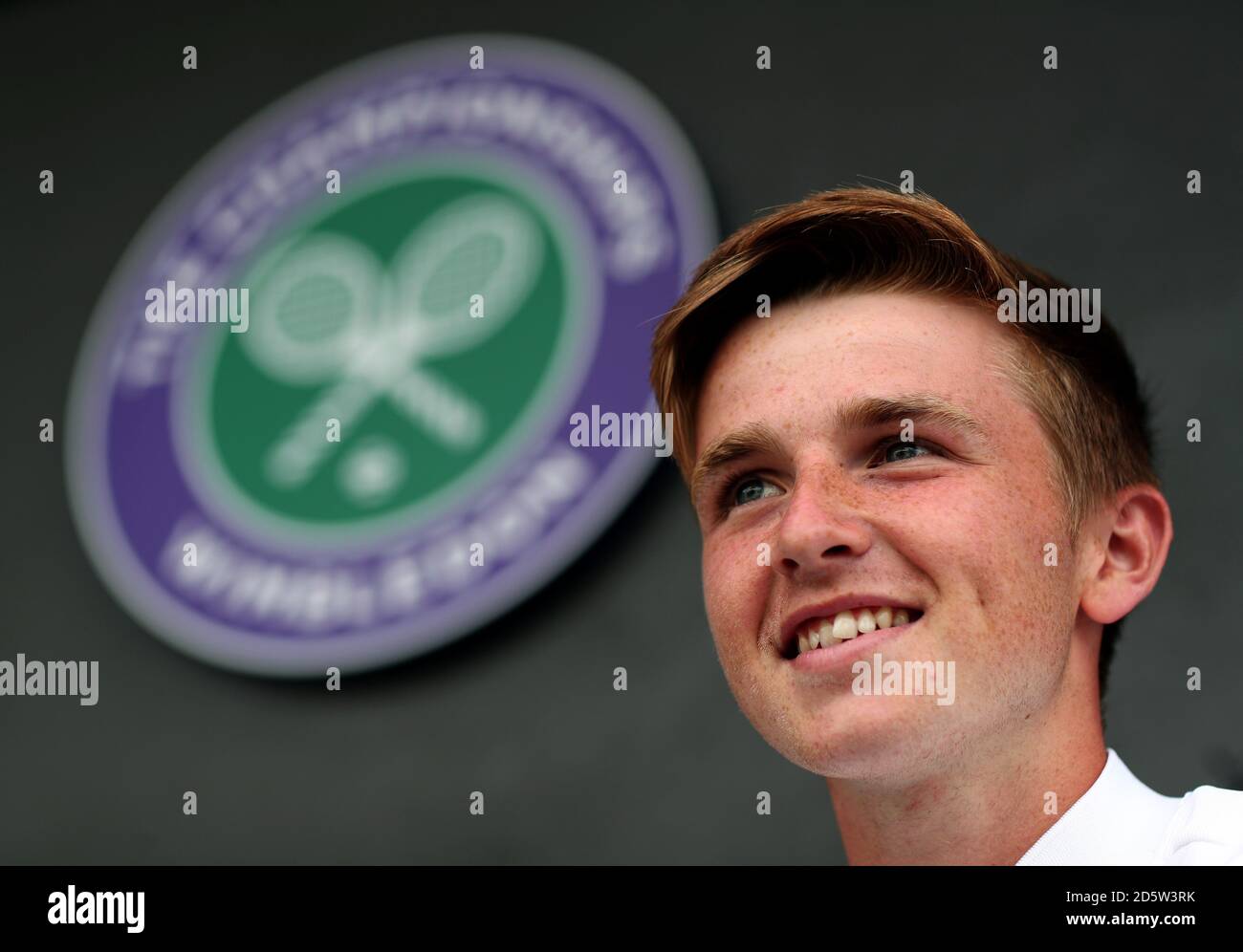 Aidan Mchugh poses for a photo within the grounds on day eleven of the Wimbledon Championships ...