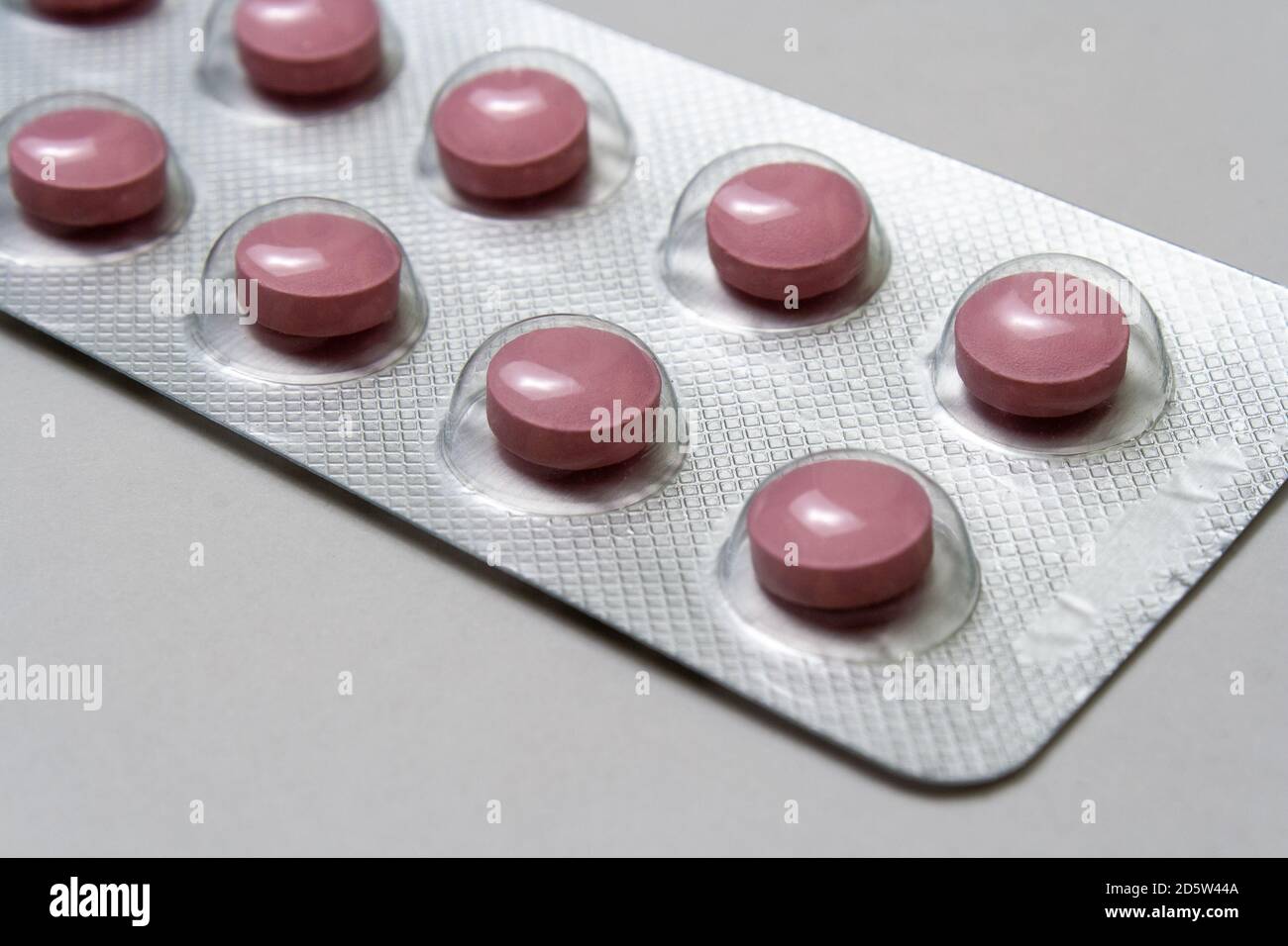 Round pill pink hi-res stock photography and images - Alamy