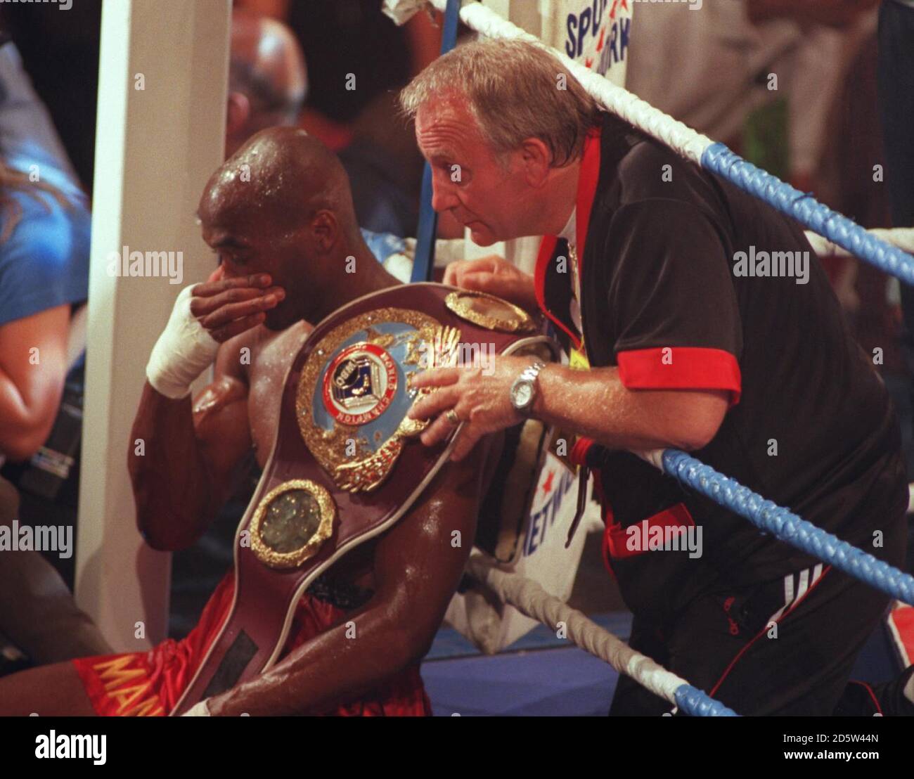 Jason Matthews in tears with his trainer and the championship belt ...