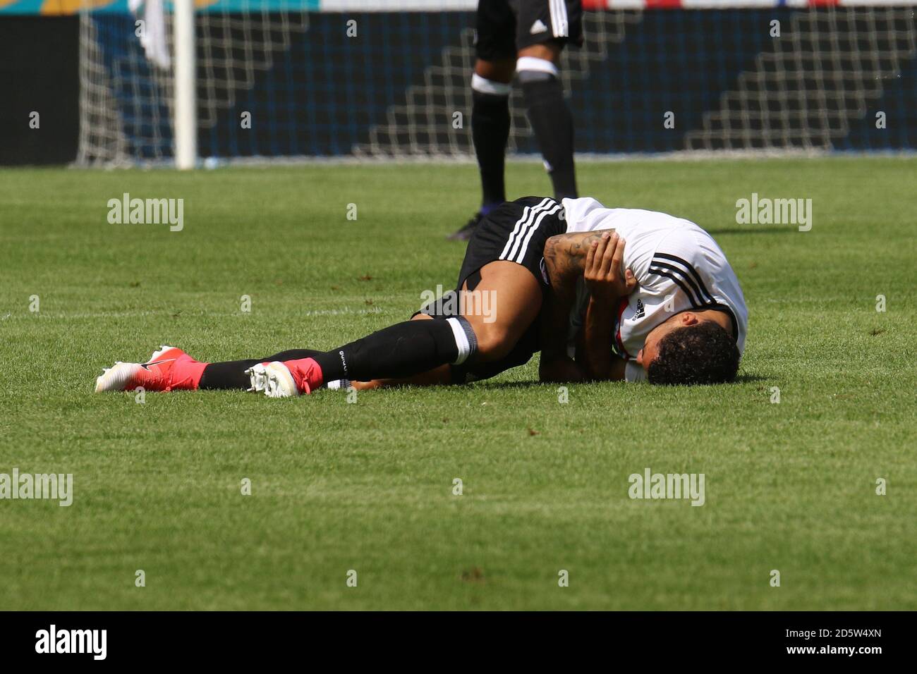 Fulham's Ryan Fredericks reacts to an injury Stock Photo - Alamy