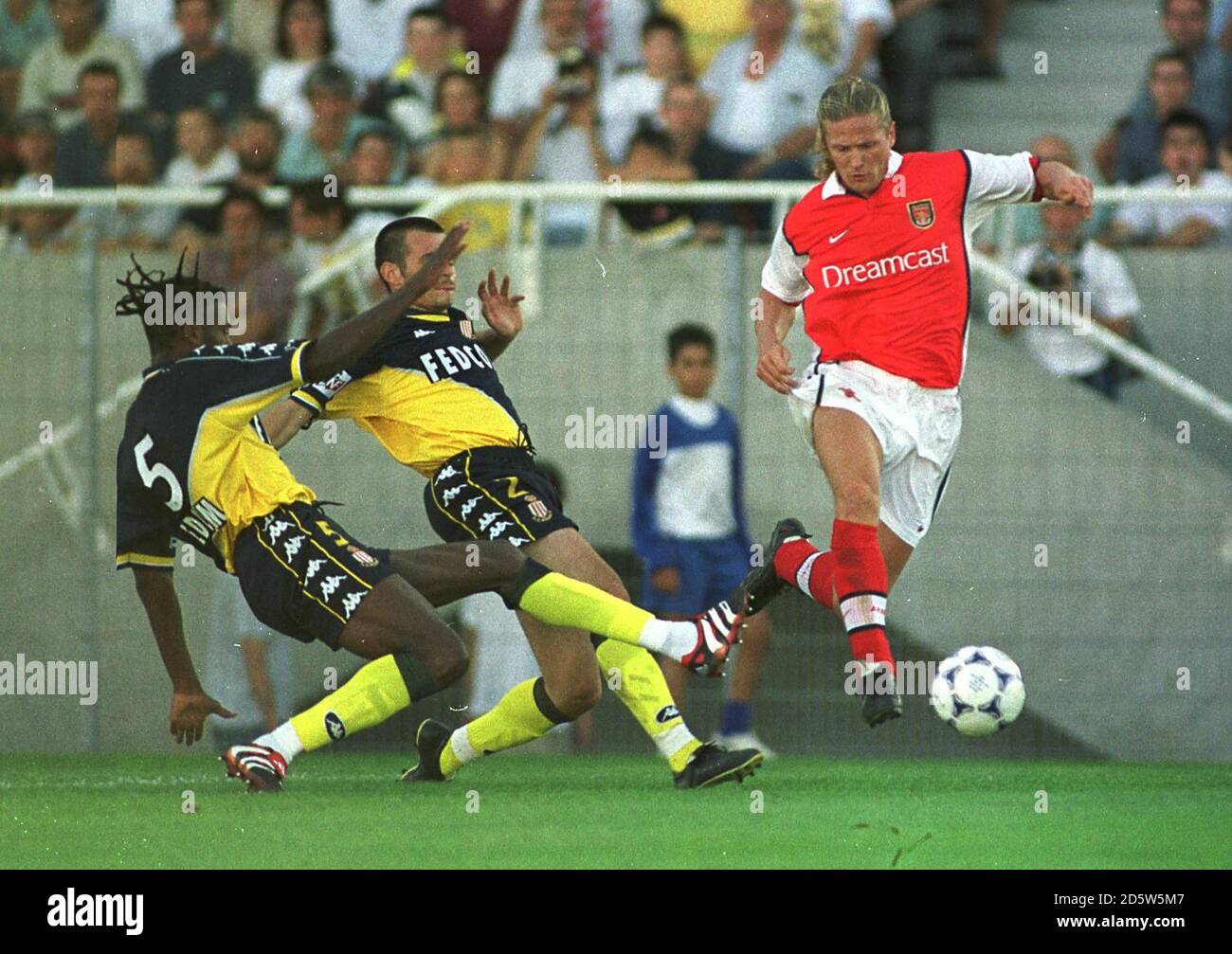 Arsenal's Emmanuel Petit goes around Monaco's Christanval and Sagnol ...