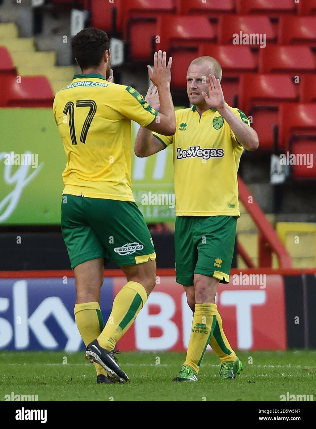 Norwich Citys Yanic Wildschut (left) celebrates scoring his side's ...