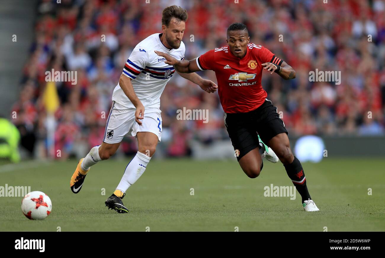 Manchester United's Antonio Valencia and Sampdoria's Daniel Pavlovic ...