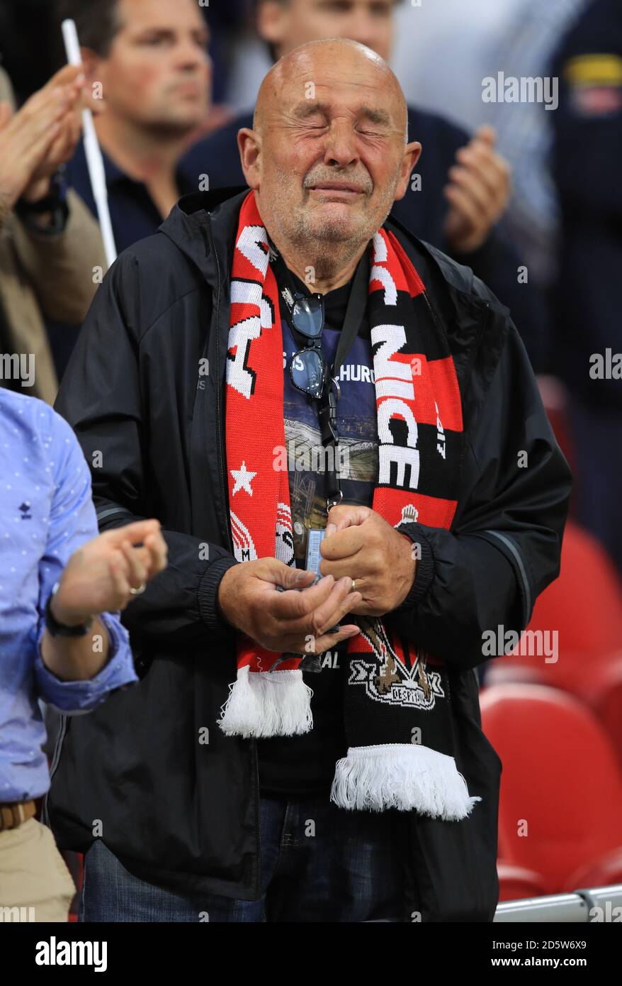 A fan is in tears as the club show a tribute to Ajax's Abdelhak Nouri ...