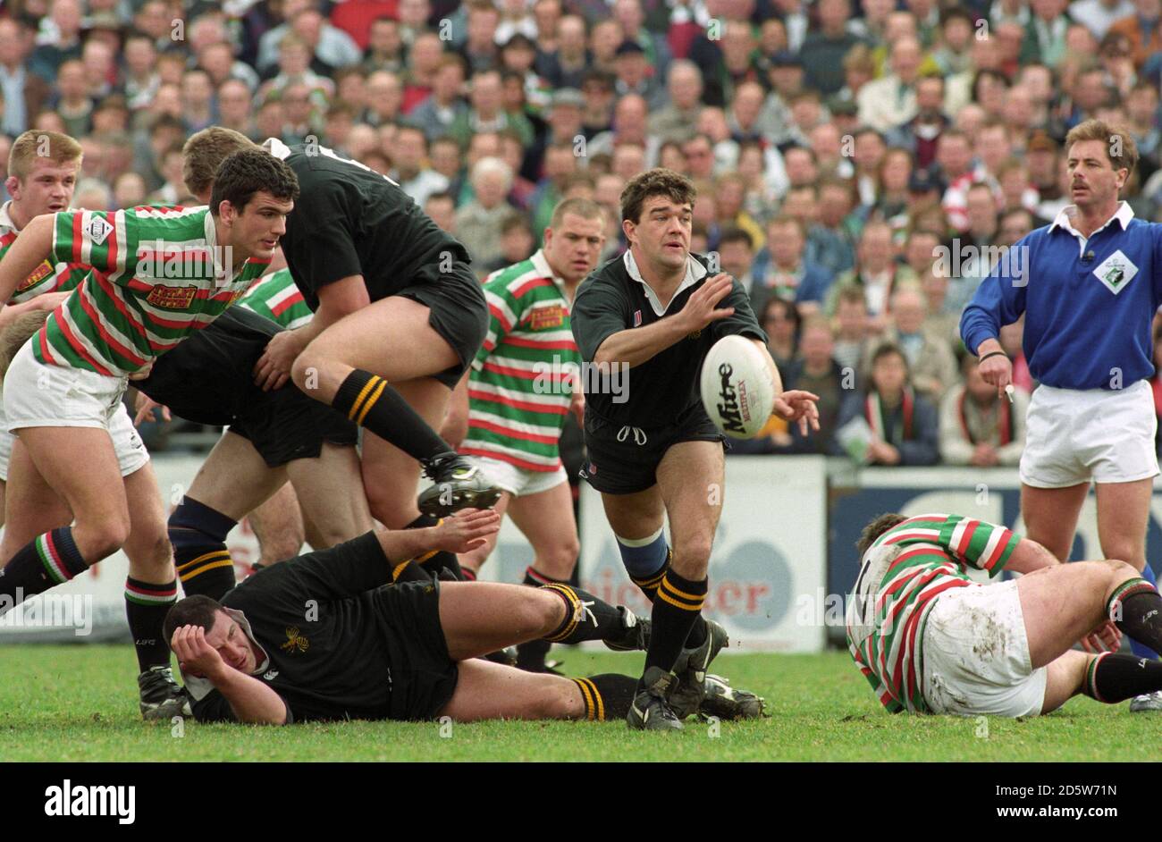 (L-R) Martin Johnson and Steve Bates (London Wasps) clears the ball ...