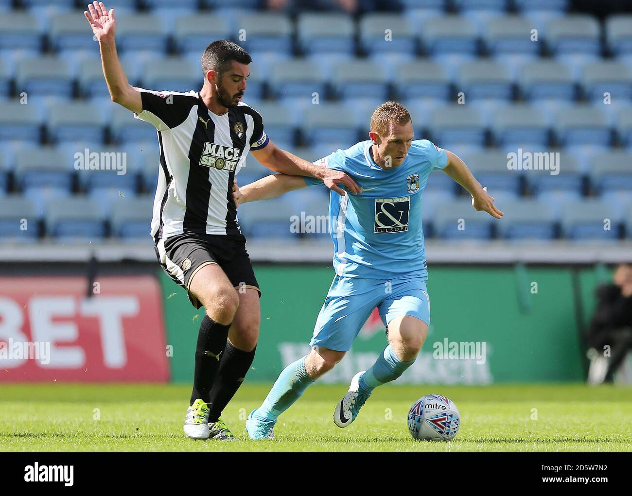 Coventry City's Stuart Beavon (right) and Notts County's Richard Duffy ...