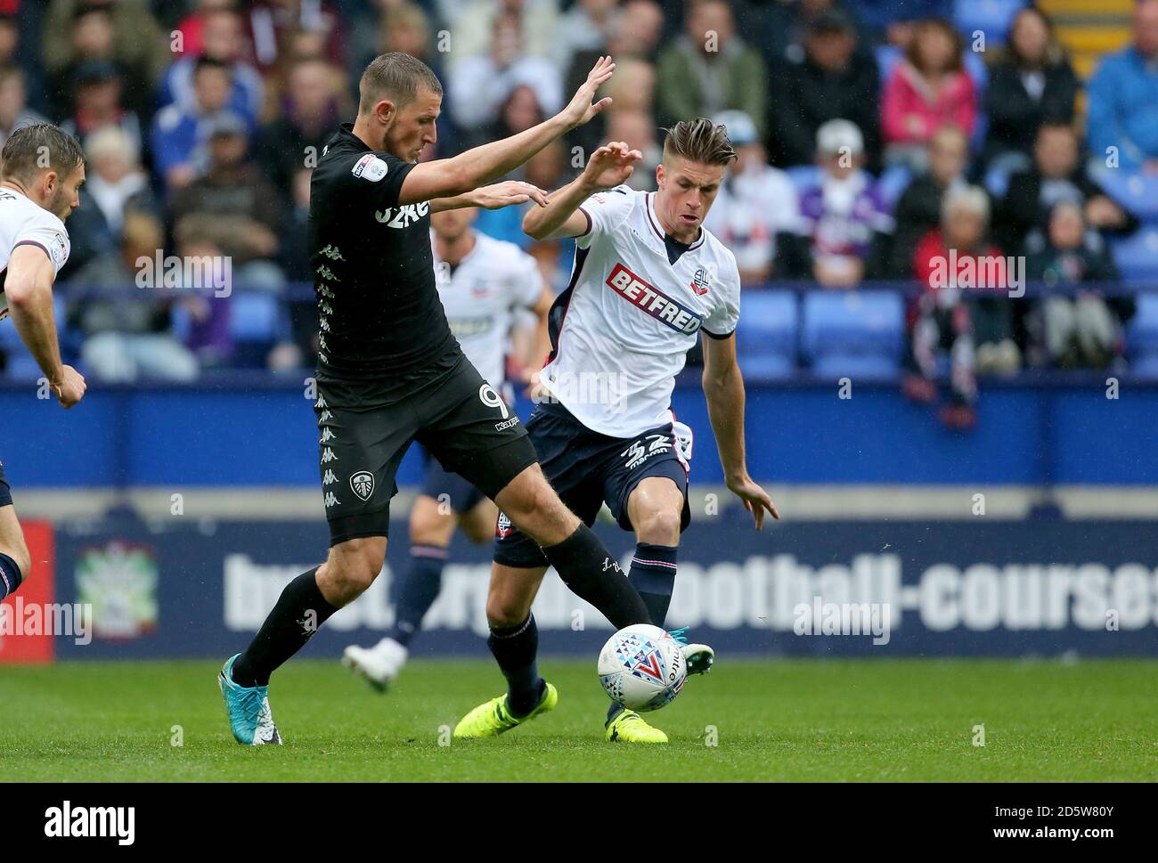Leeds United's Chris Wood and Bolton Wanderers' Reece Burke Stock Photo ...