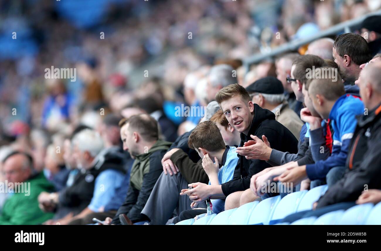 Coventry City fans in the stands Stock Photo - Alamy