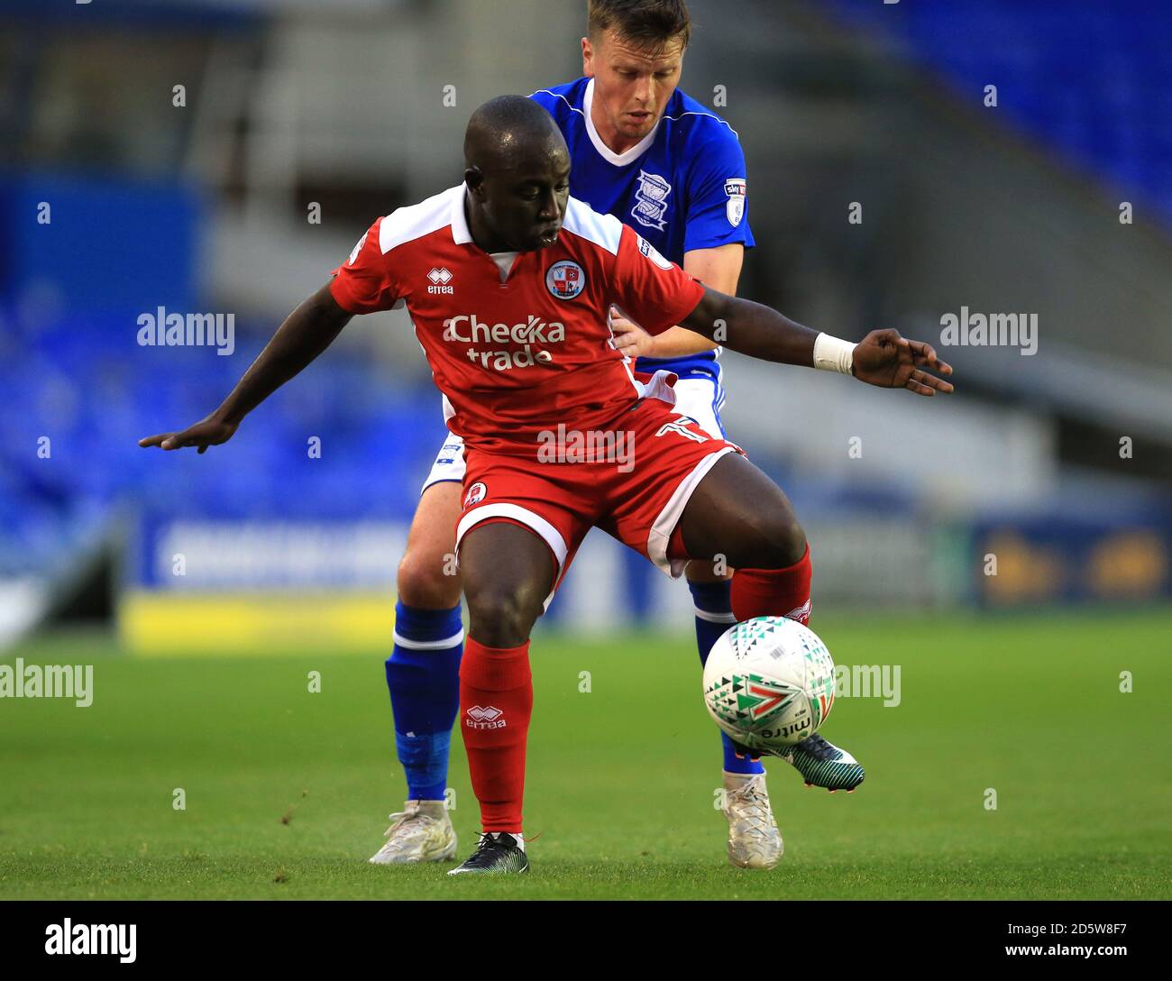 Birmingham City's Stephen Gleeson and Crawley Town's Kaby Djalo (front ...