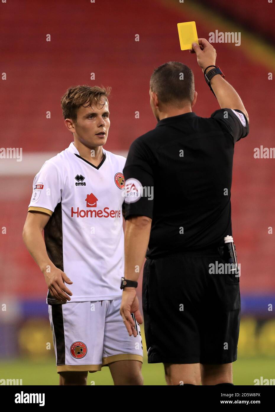 Walsall's Liam Kinsella receives a yellow card Stock Photo - Alamy