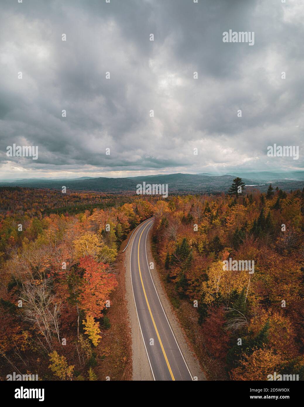 Autumn color and road near Abbot, Maine Stock Photo - Alamy