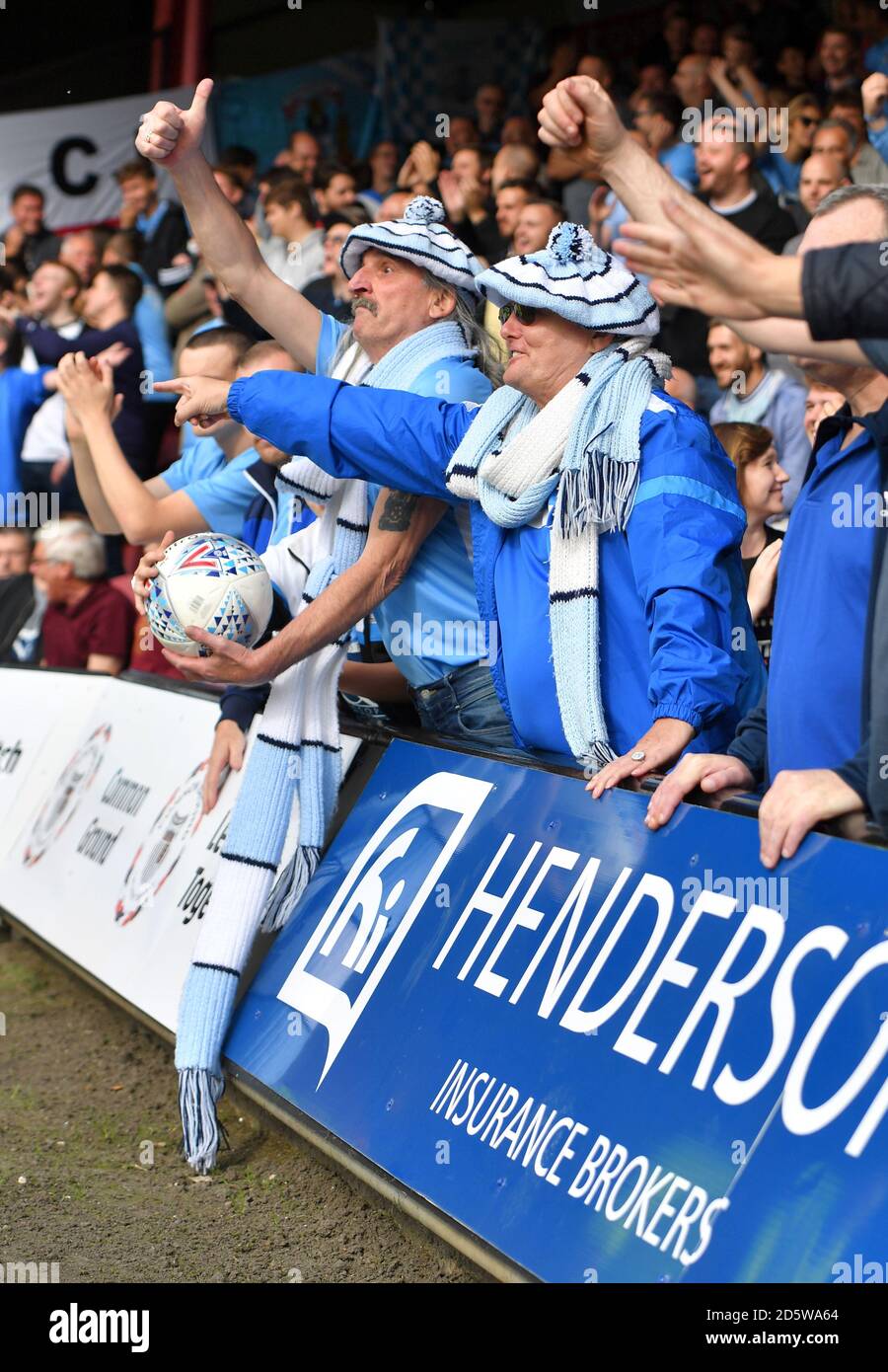 Coventry City fans in the stands Stock Photo - Alamy