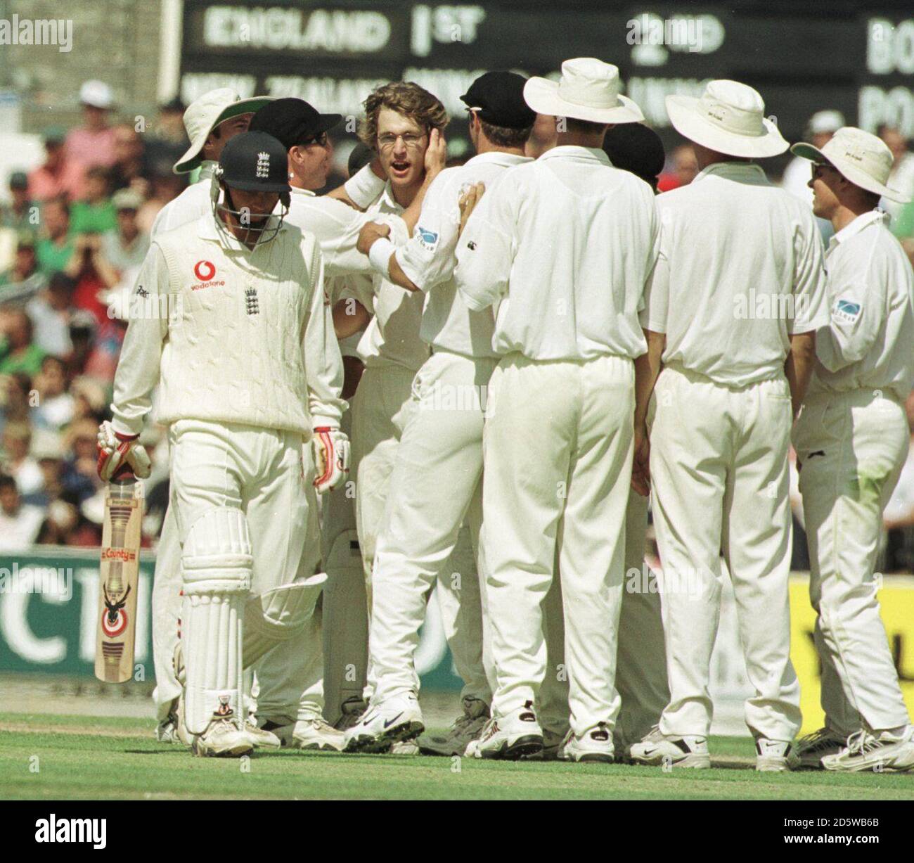 New Zealand celebrate as England's Darren Maddy leaves the field. Maddy ...