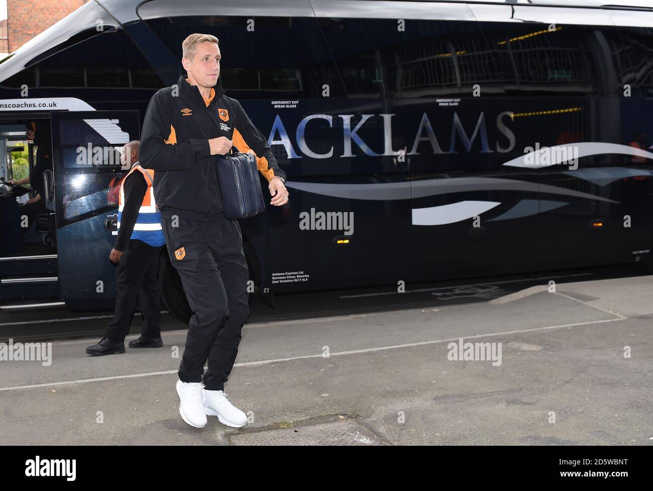 Hull City's Michael Dawson gets off the team bus Stock Photo - Alamy