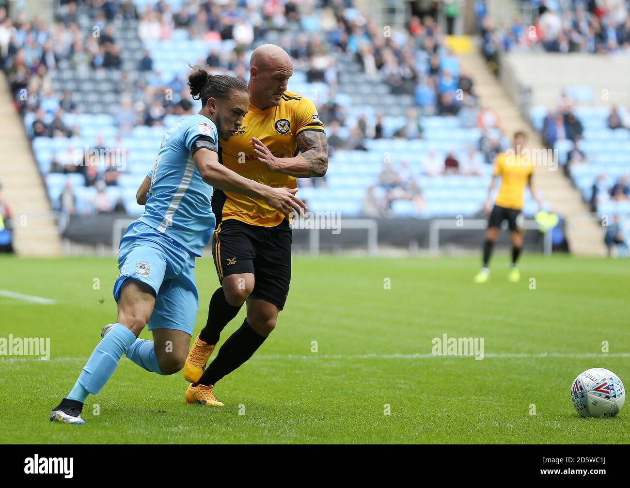 Coventry City's Jodi Jones and Newport County's David Pipe battle for ...