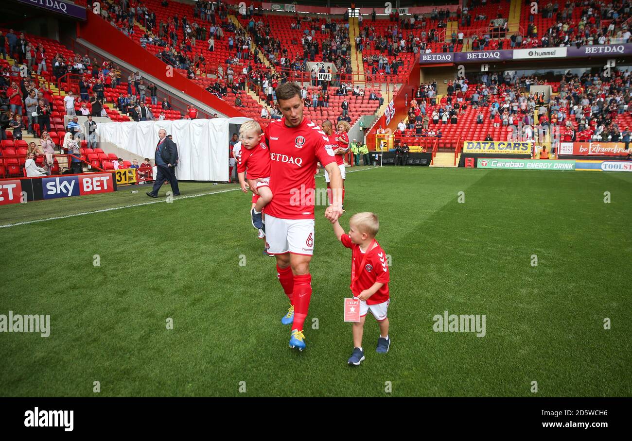 Charlton Athletic's Jason Pearce with his children as match day mascots ...