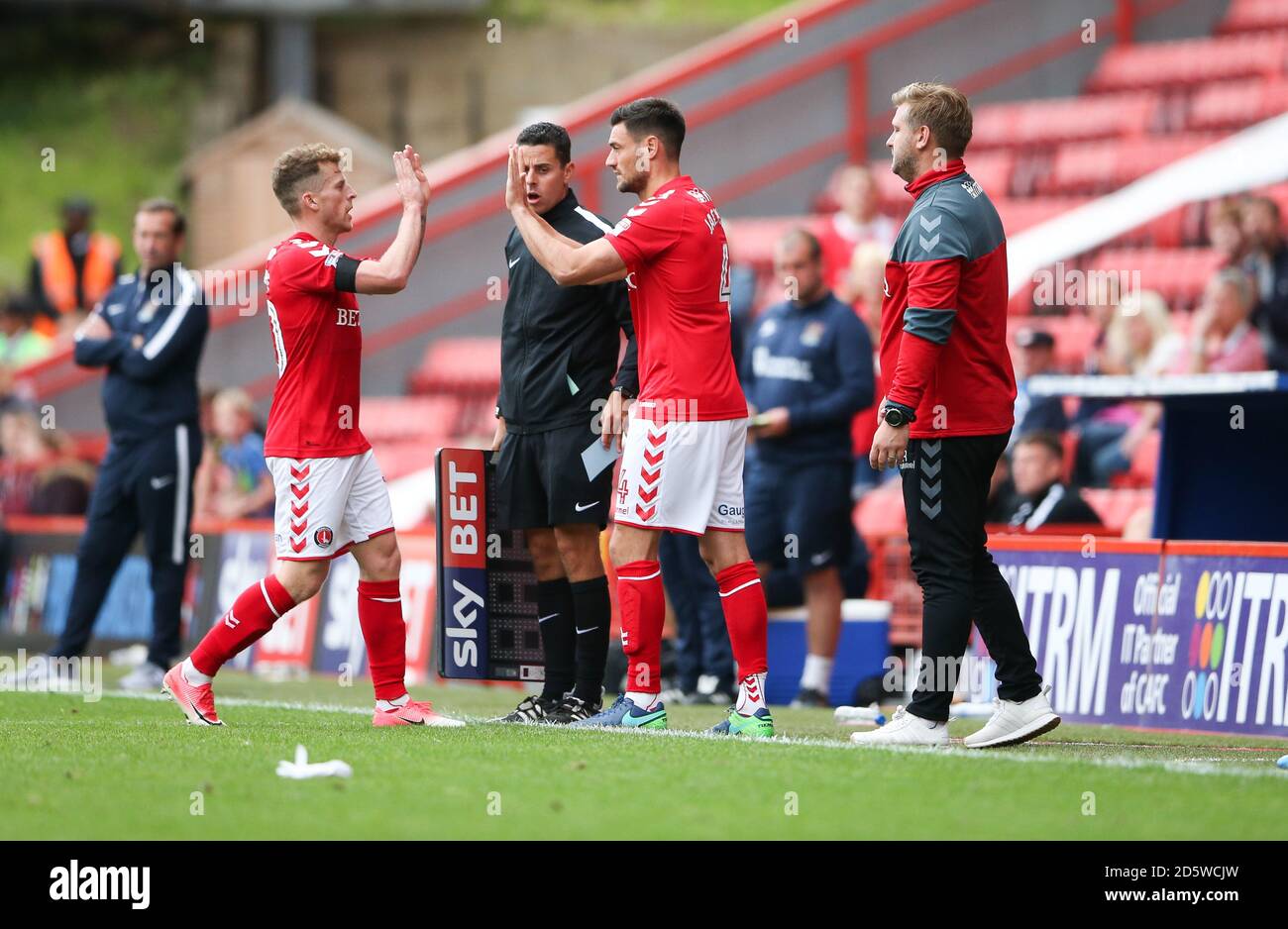 Charlton Athletic's Billy Clarke (left) comes off for Johnnie Jackson ...
