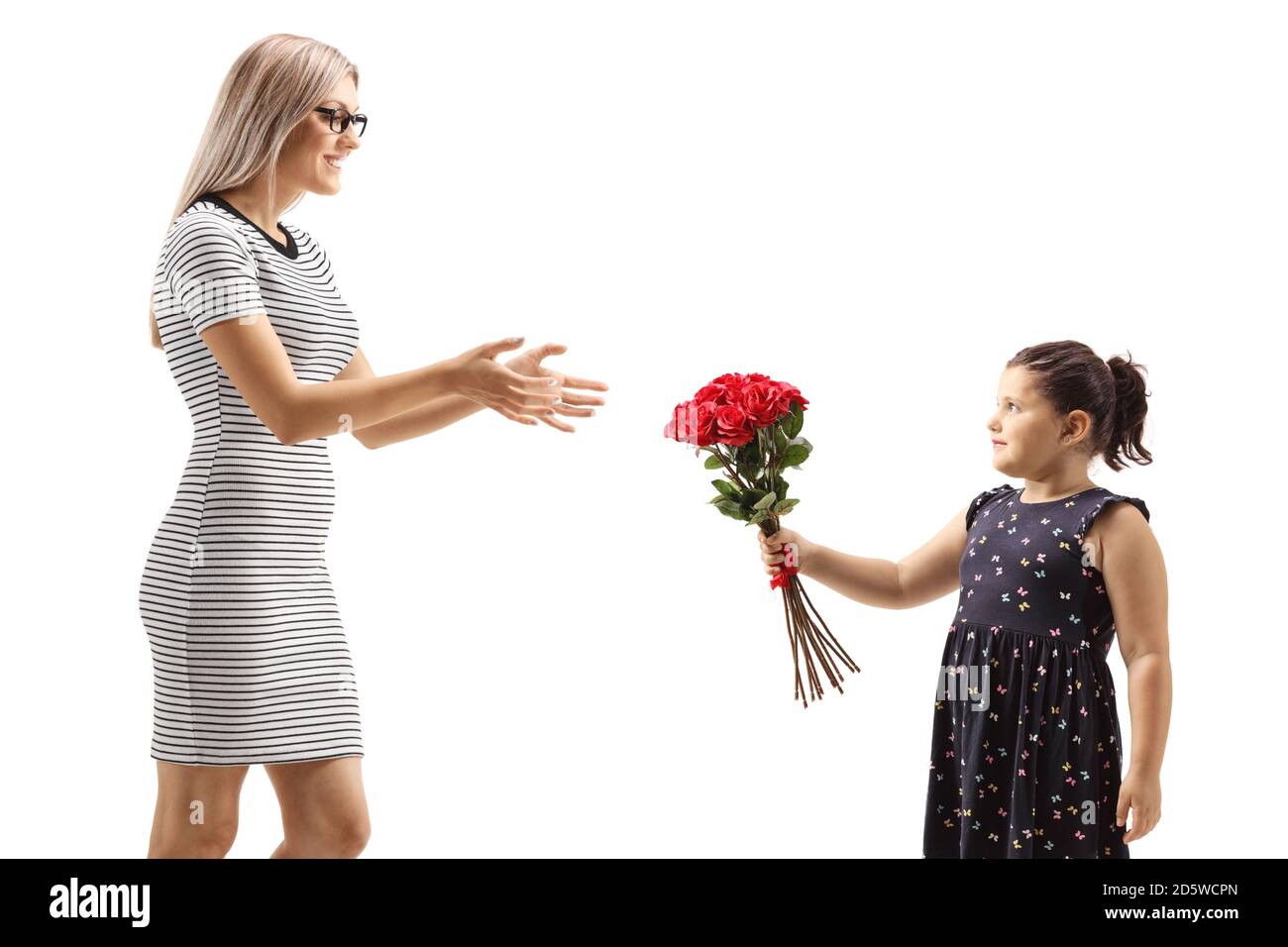 Girl giving red roses to a young woman isolated on white background ...