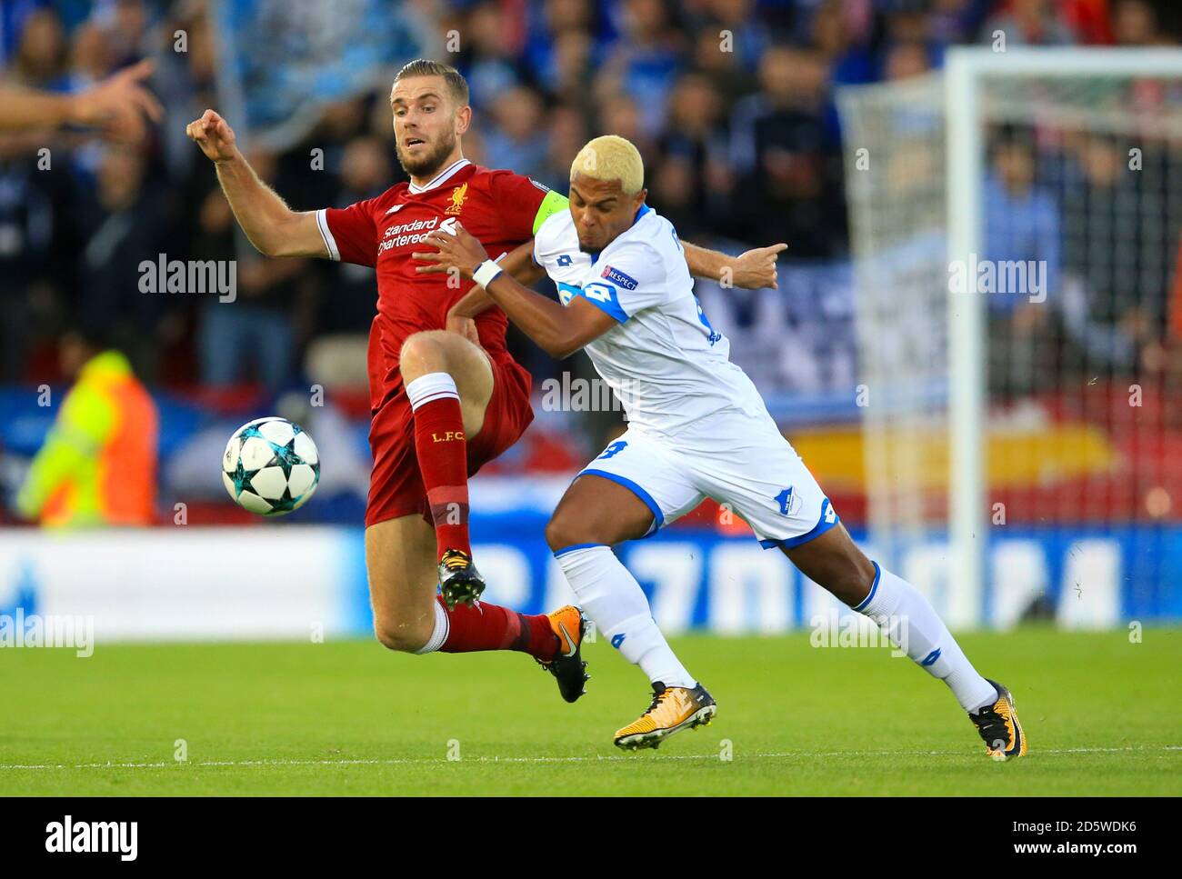 Liverpool's Jordan Henderson (left) and Hoffenheim's Serge Gnabry ...