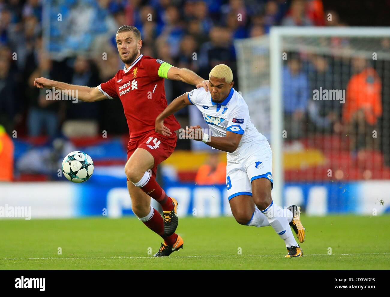 Liverpool's Jordan Henderson (left) and Hoffenheim's Serge Gnabry ...