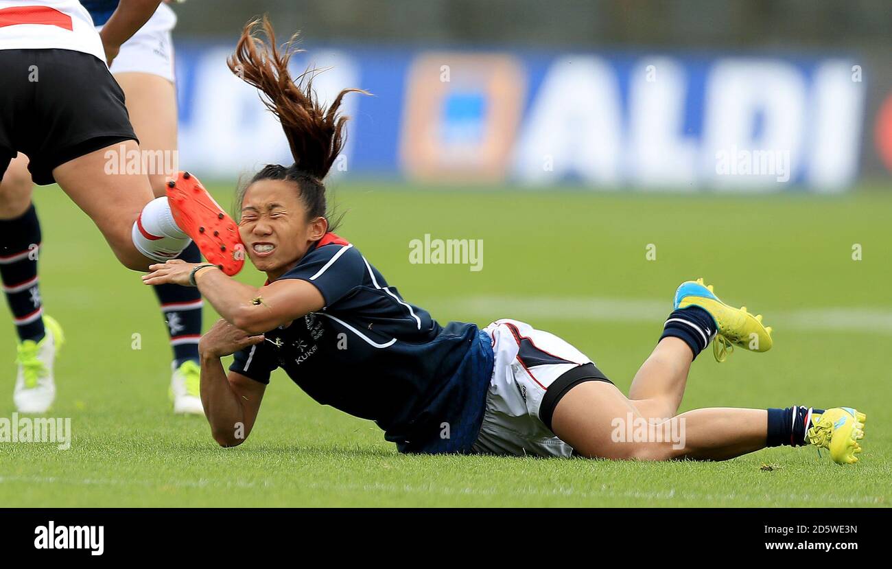 Hong Kong's Chong Ka Yan makes a tackle Stock Photo - Alamy