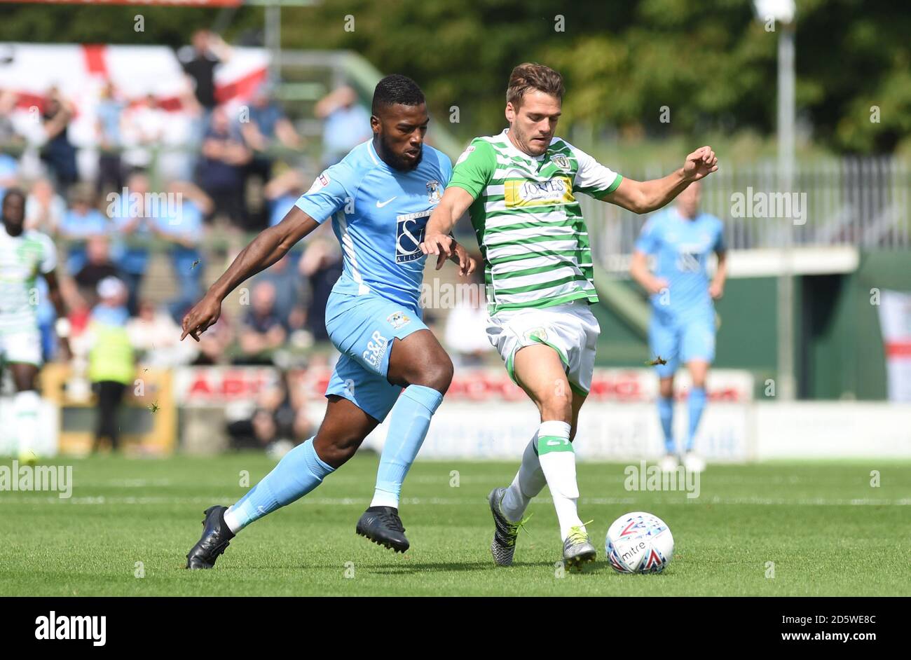 Yeovil Town's Ryan Dickson (right) and Coventry City's Duckens Nazon ...