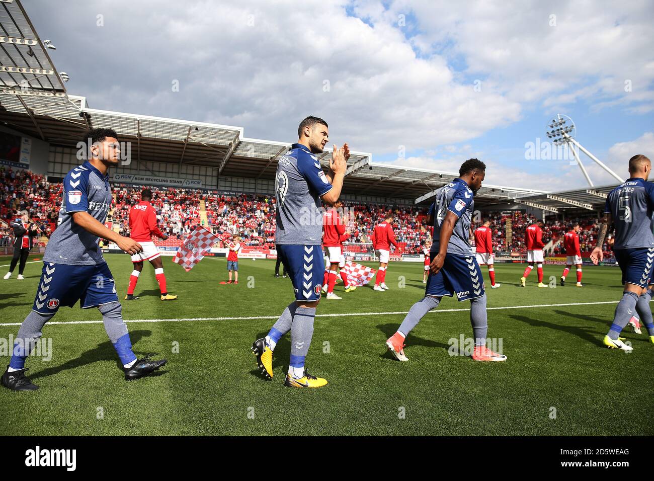 Rotherham United's and Charlton Athletic's players enter the pitch ...