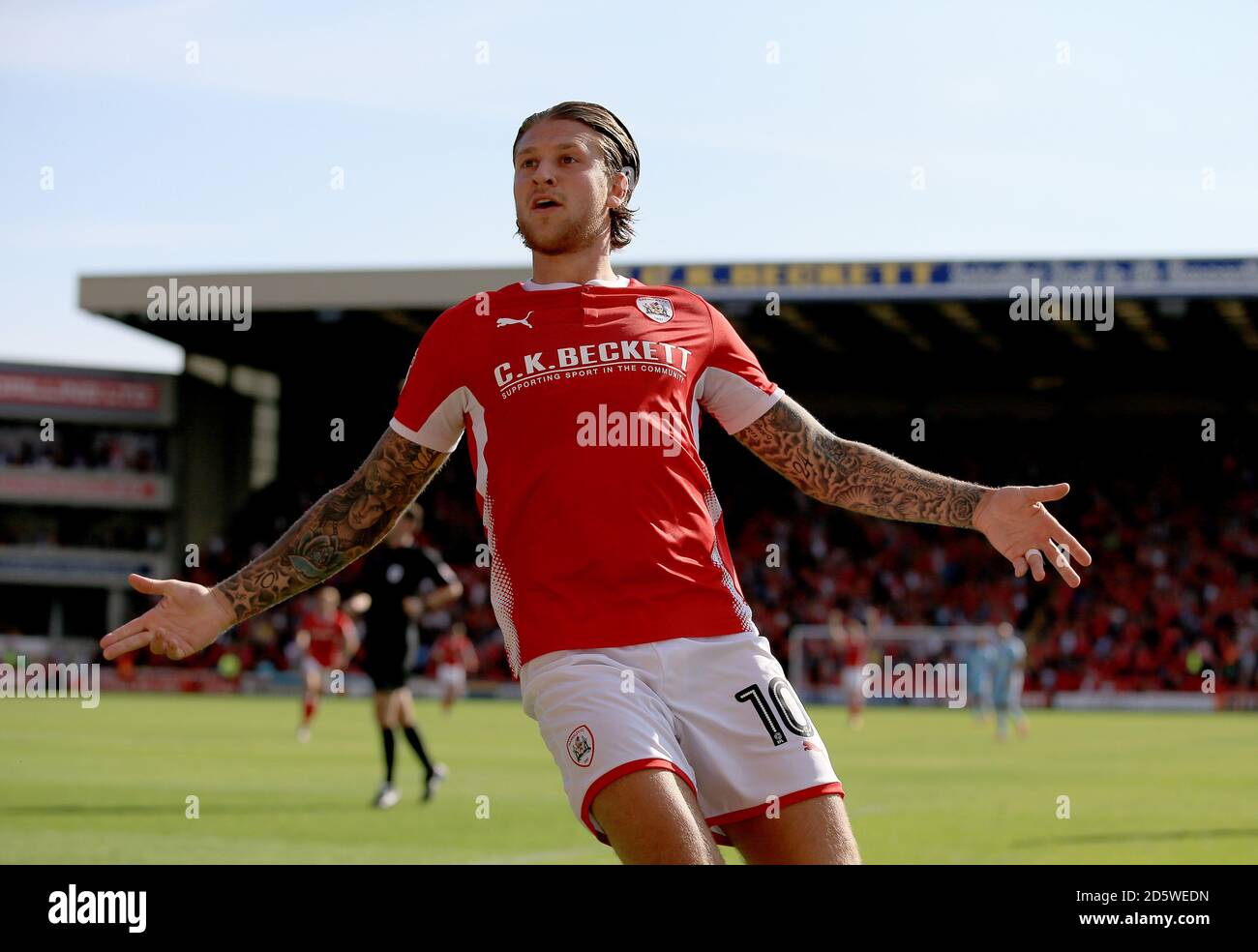 Barnsley's George Moncur celebrates after he scores his sides third ...