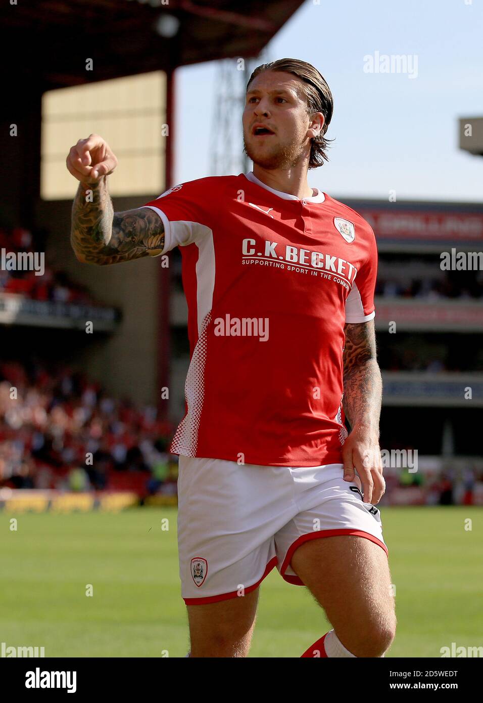 Barnsley's George Moncur celebrates after he scores his sides third ...
