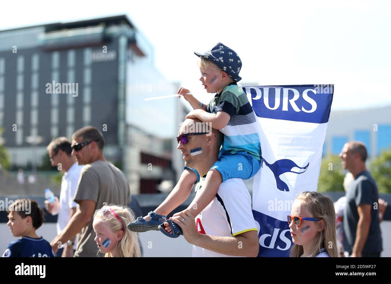 Tottenham Hotspur supporters make their way to the game Stock Photo - Alamy