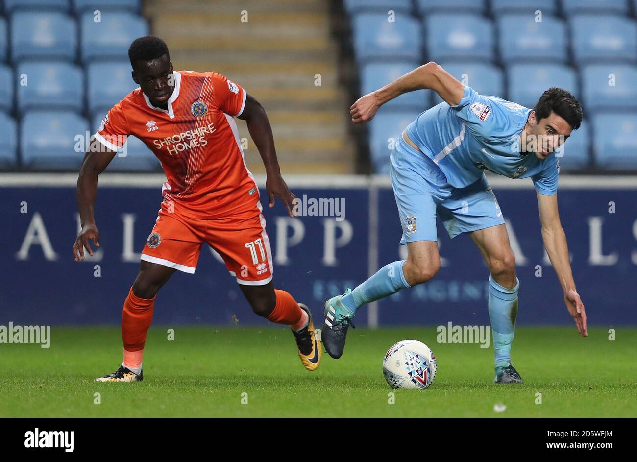 Coventry City's Peter Vincenti and Shrewsbury Town's Arthur Gnahoua ...