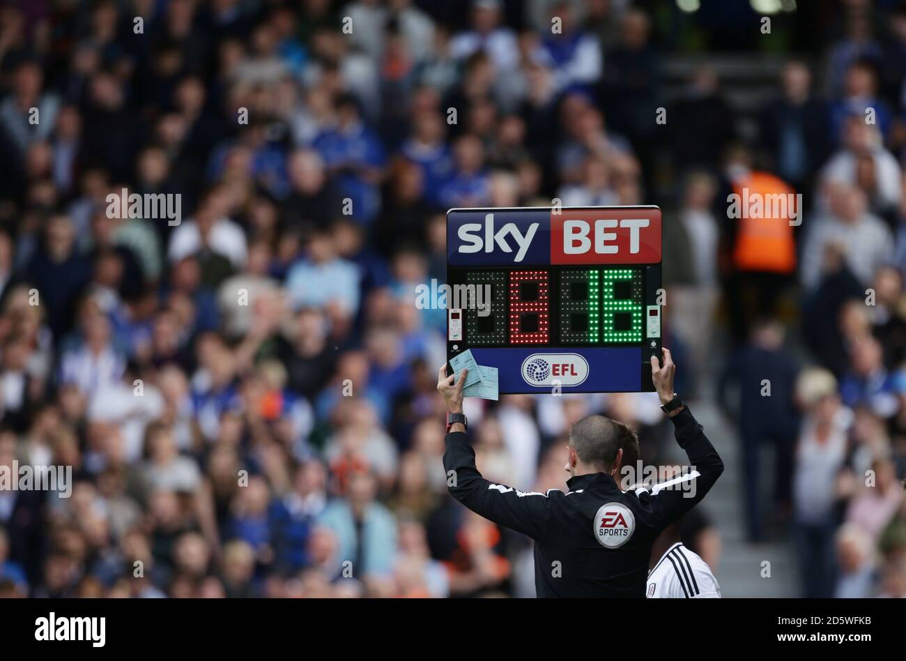 The fourth official holds up the electronic substitution board during the Sky Bet Championship ...