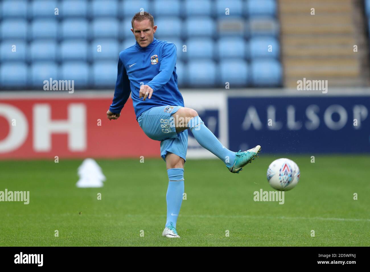 Coventry City's Stuart Beavon wrams up before the game Stock Photo - Alamy