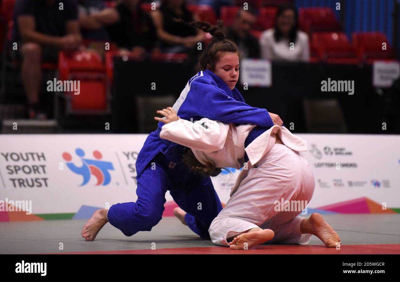 England's Chloe Dodge and Scotland's Rebecca Lamb compete during the ...
