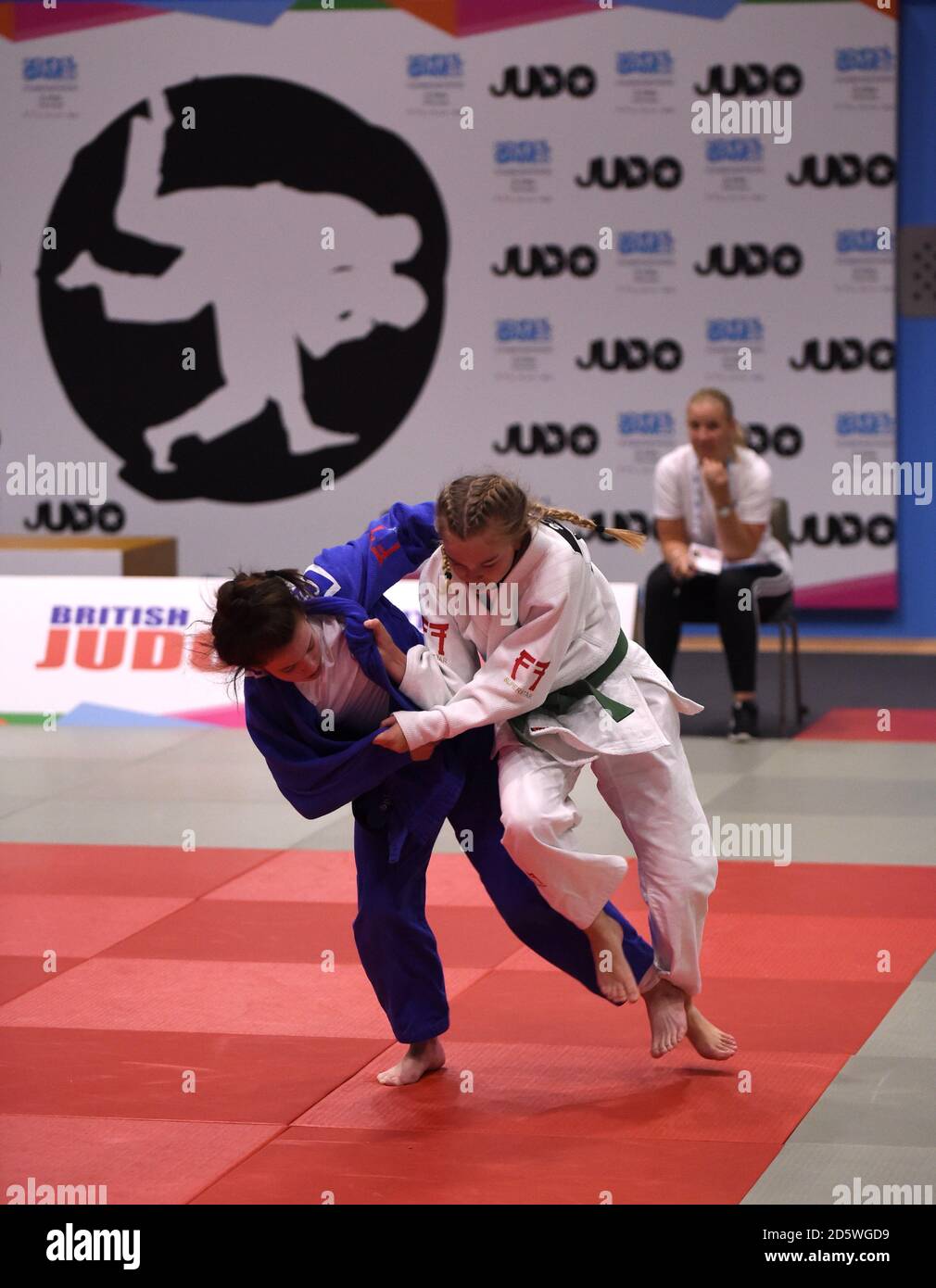 Wales' Ffion Robinson and England's Chloe Dodge compete during the Judo ...