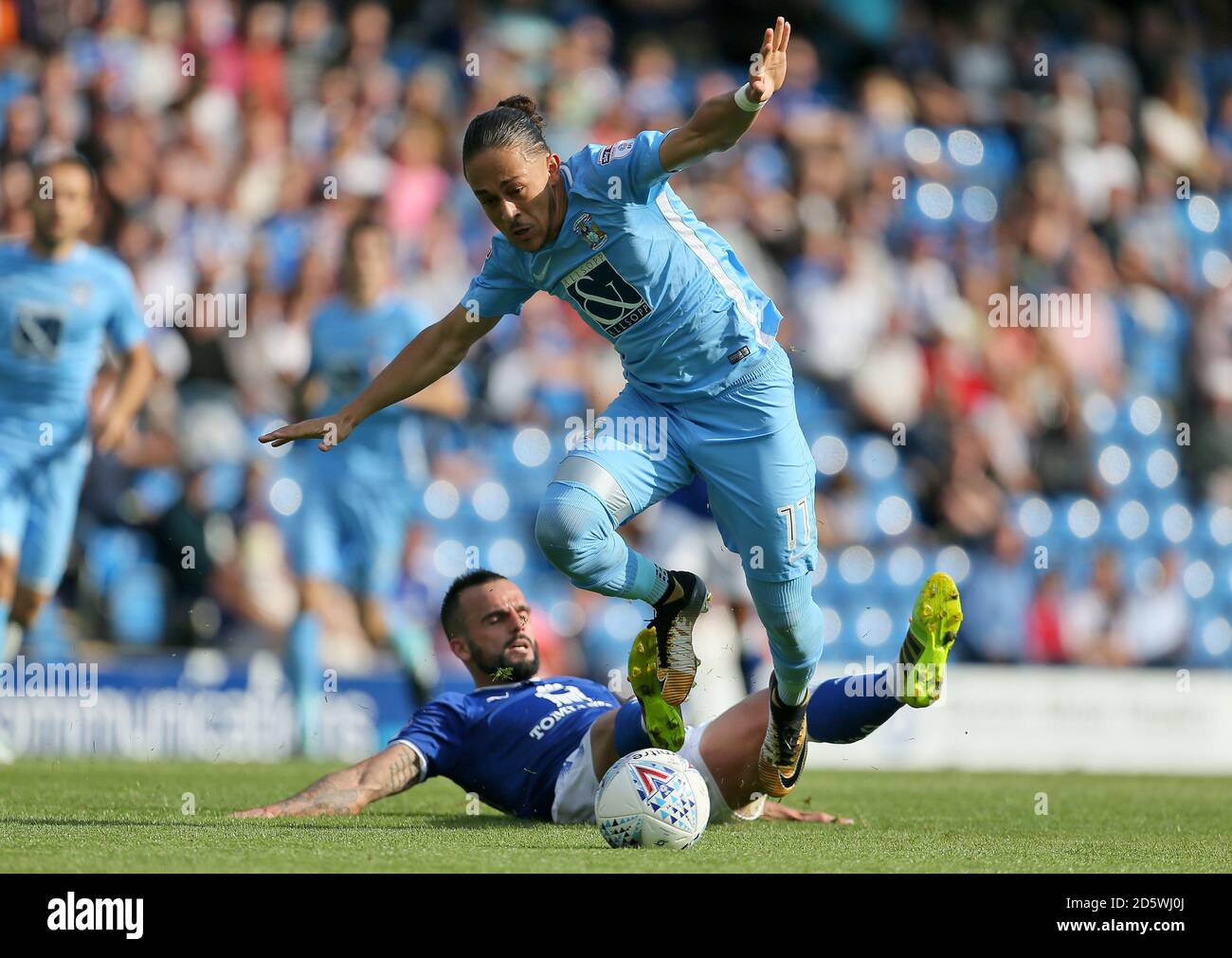 Chesterfield's Robbie Weir (left) challenges Coventry City's Jodi Jones ...