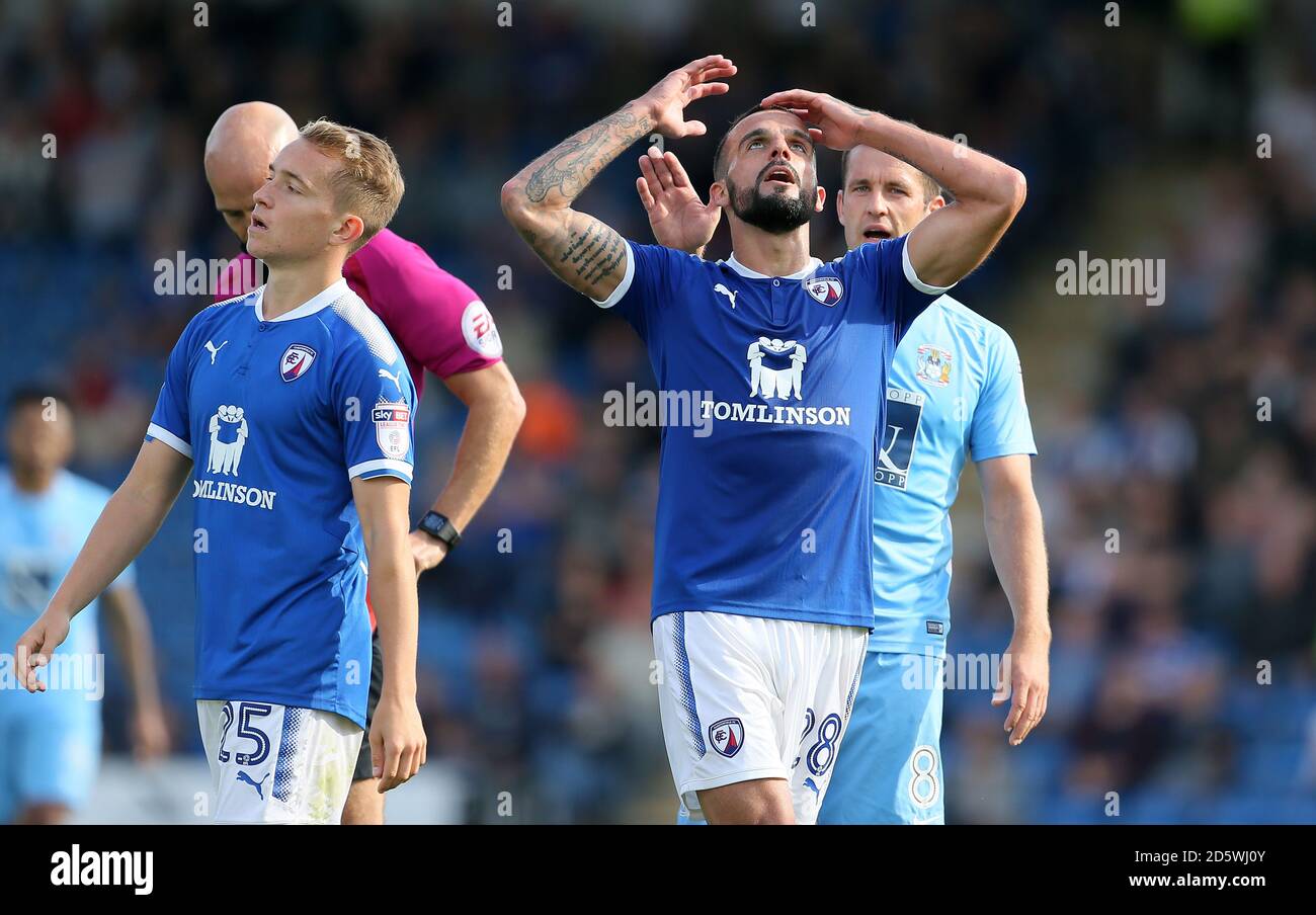 Chesterfield's Robbie Weir looks dejected after being shown a red card ...