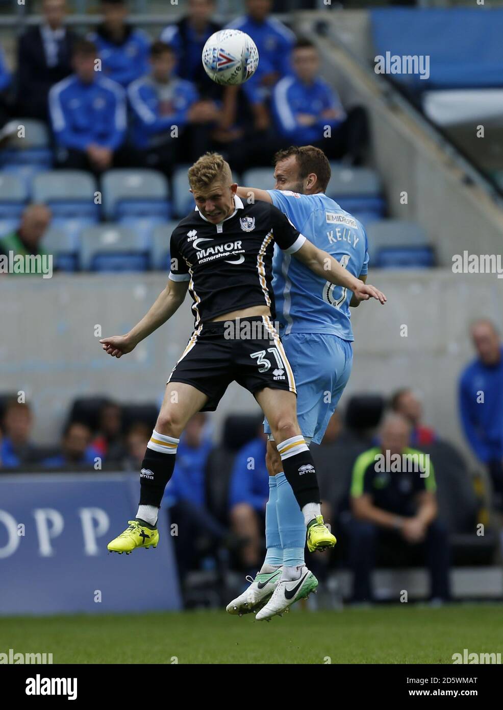Coventry City's Liam Kelly and Port Vale's Ben Whitfield battle for the ...