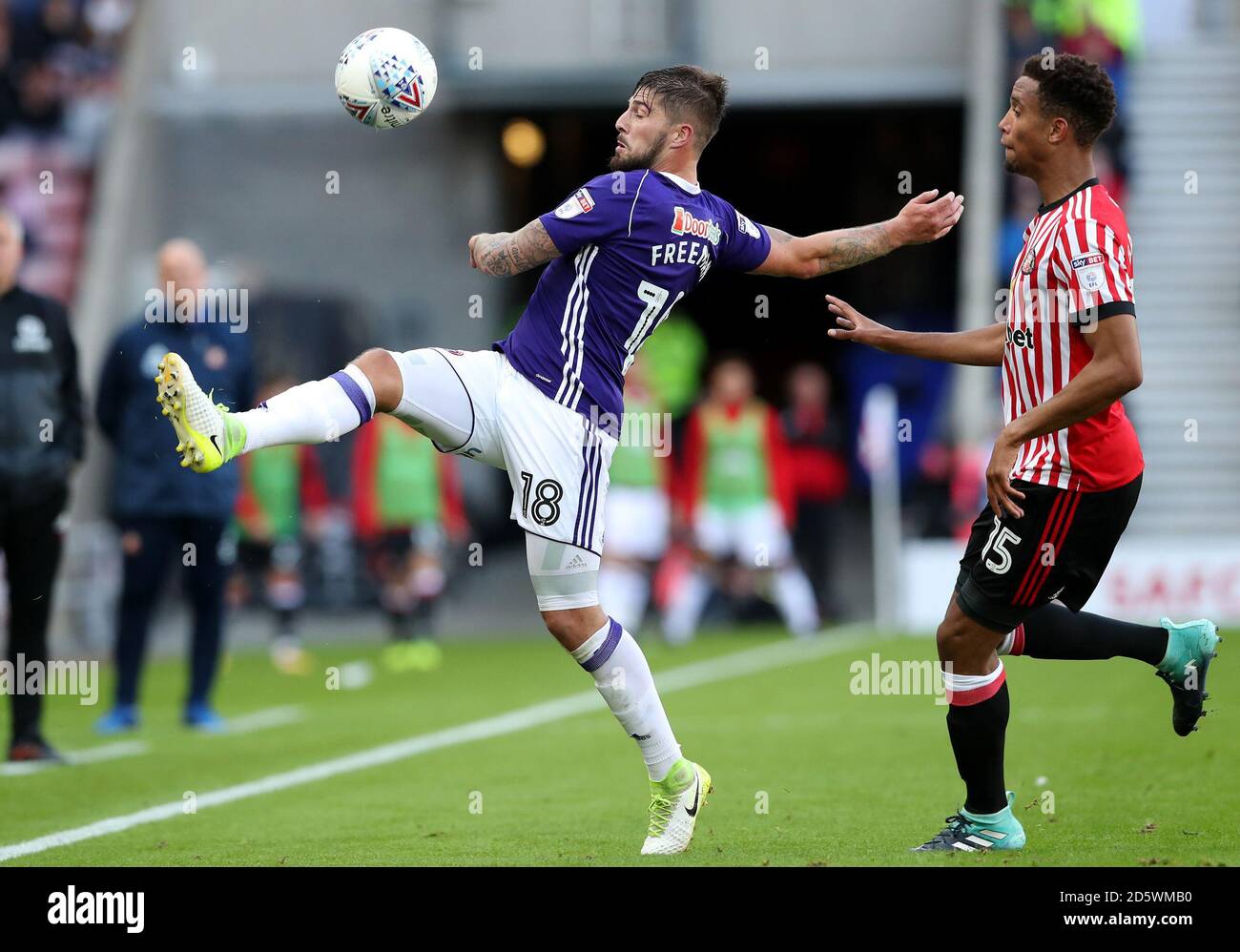 Sunderland's Brendan Galloway (right) and Sheffield United's Kieron ...