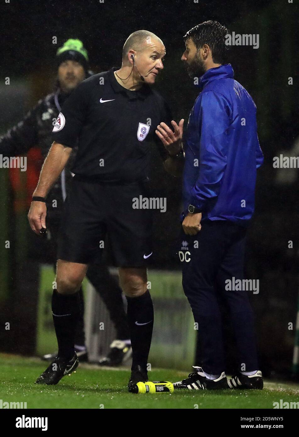 Lincoln City manager Danny Cowley speaks with referee Lee Swabey Stock ...