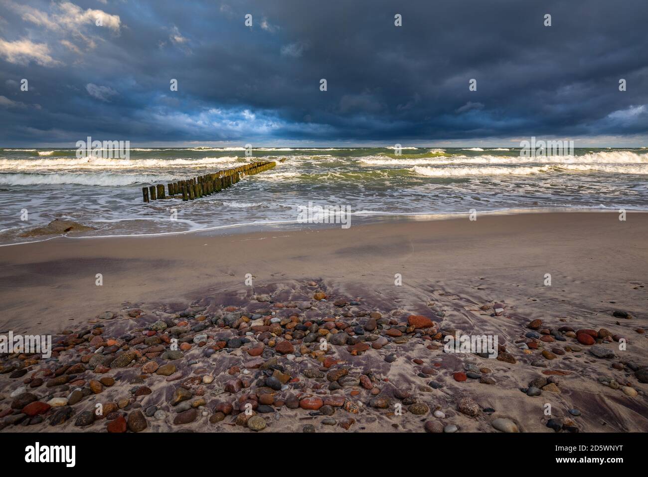 Baltic sea on the Polish coast with wavebreaker Stock Photo - Alamy