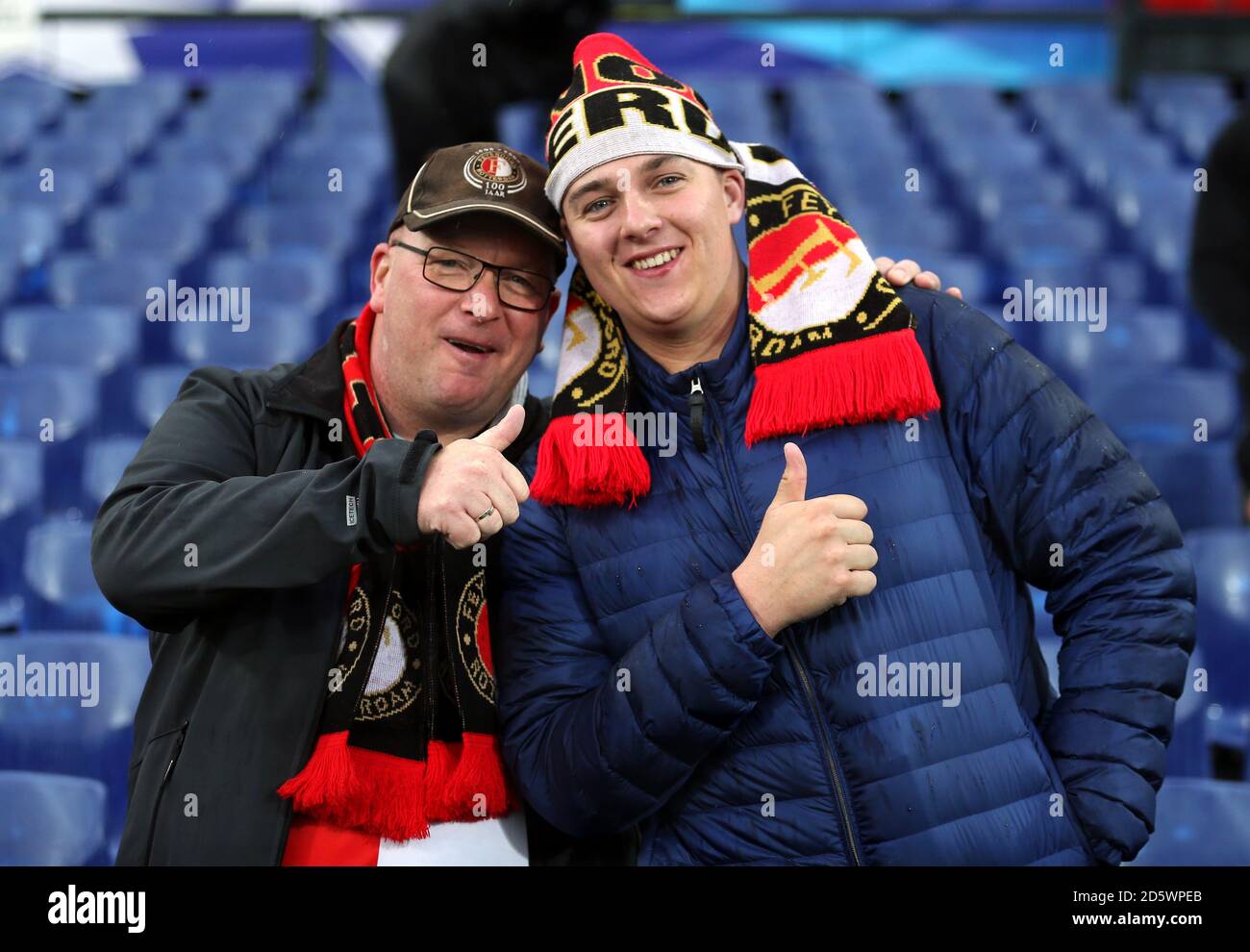 Feyenoord fans in the stands Stock Photo - Alamy