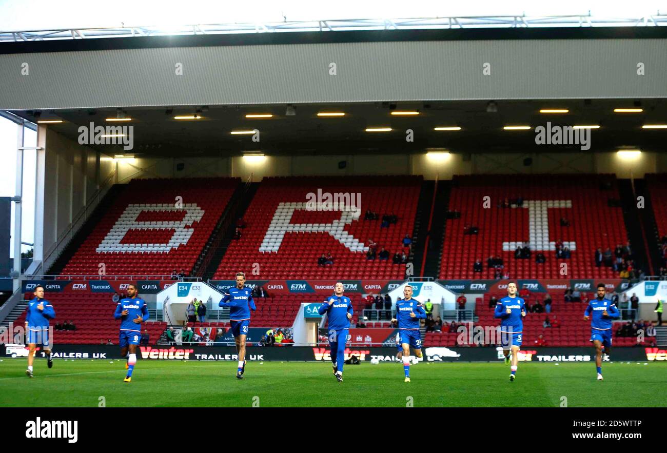 Stoke City's Peter Crouch (third left) and Charlie Adam (centre) during ...