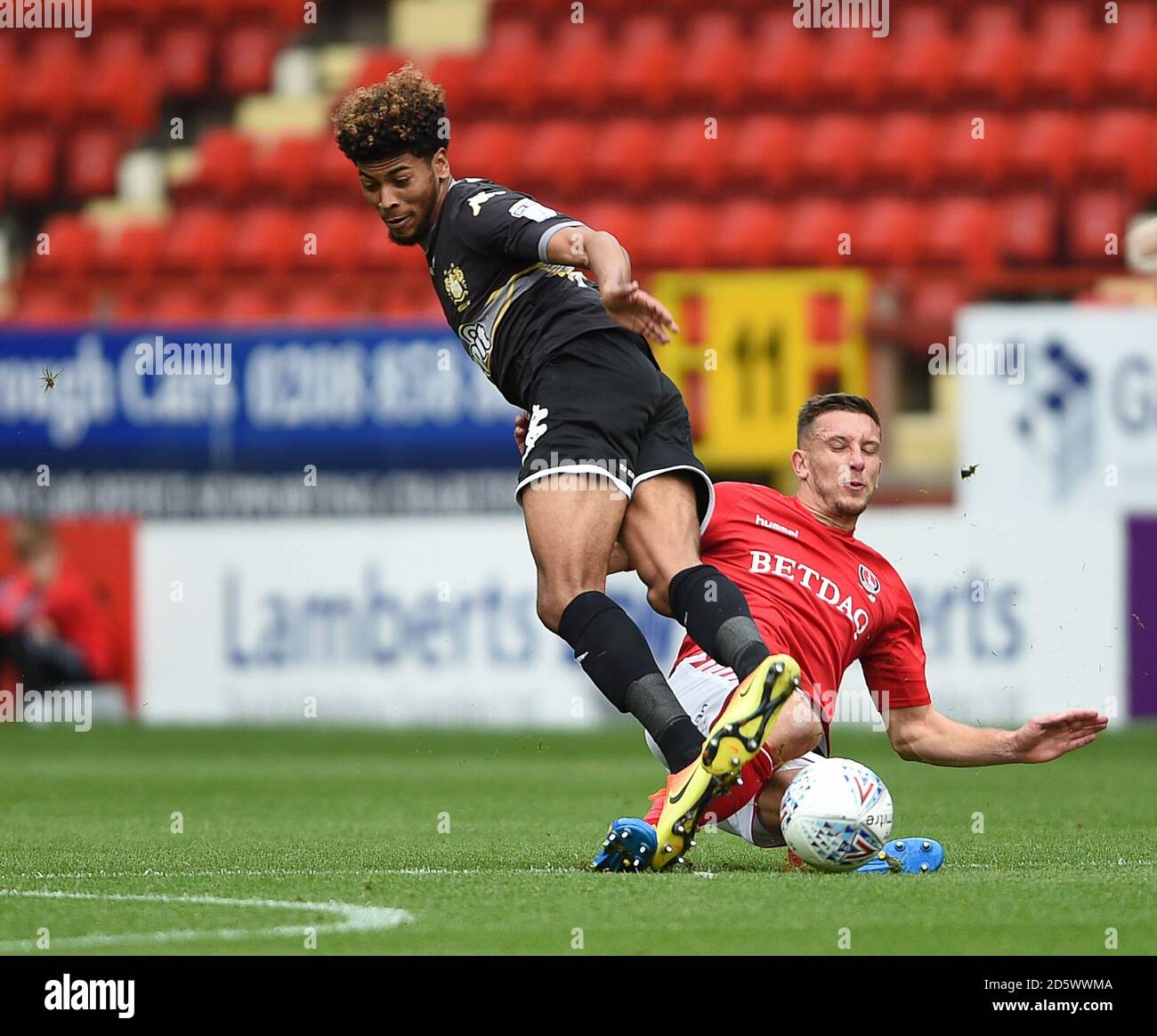 Charlton Athletic's Jason Pearce tackles Bury's Josh Laurent Stock ...