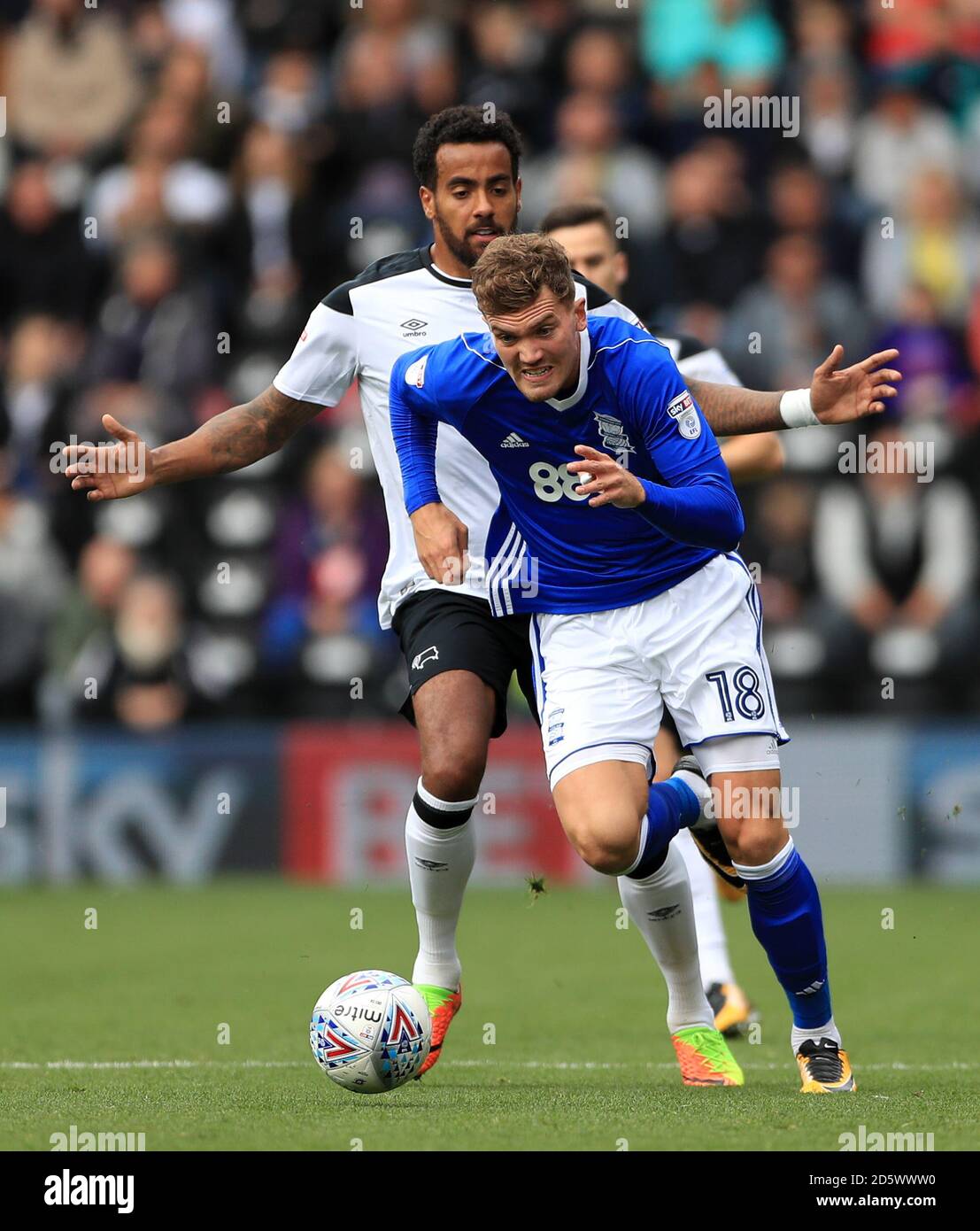 Birmingham City's Sam Gallagher gets past Derby County's Tom ...