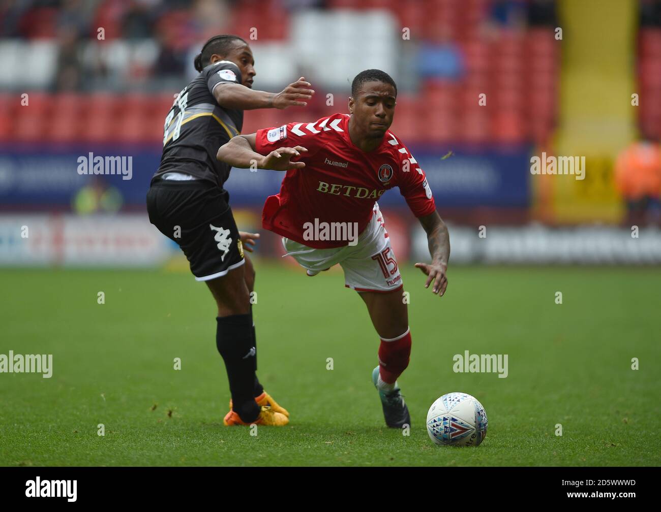 Charlton Athletic's Ezri Konsa is fouled by Bury's Neil Danns Stock ...
