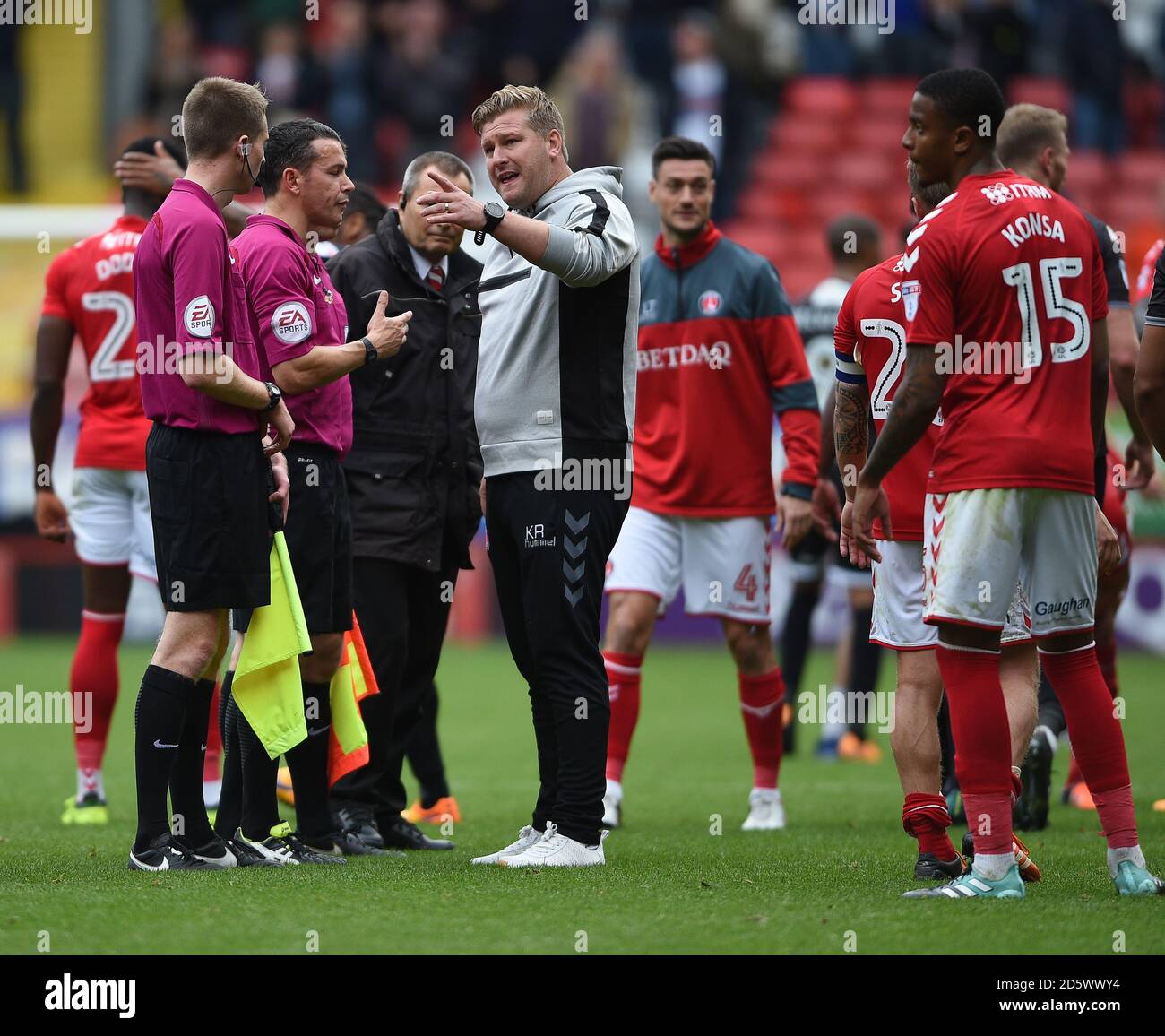 Charlton Athletic Manager Karl Robinson talks to referee Dean ...