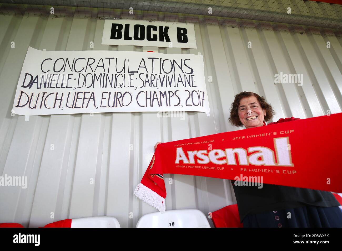 Arsenal fan Maria Petri next to a banner ahead of the match Stock Photo ...